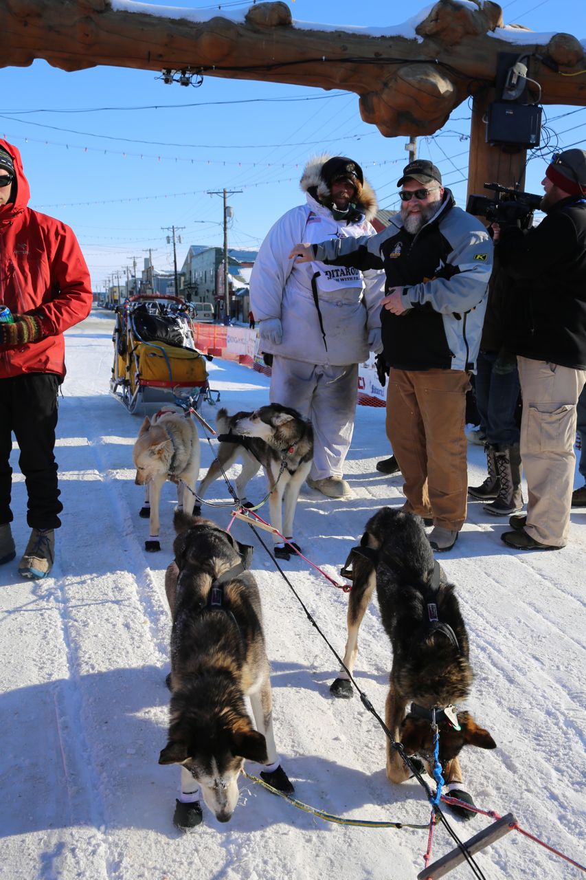 More Teams coming in, and back over the trail in 1 hr 45 minutes – Iditarod