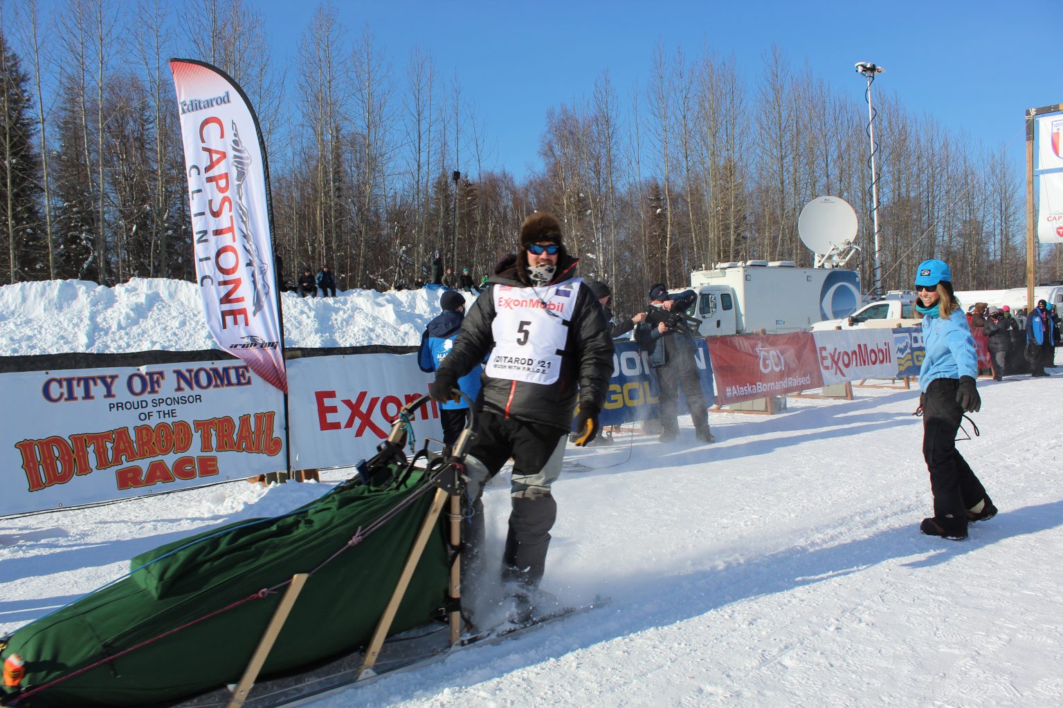 Rookie Iditarod musher Jeremy Traska scratches at Nikolai (S ...