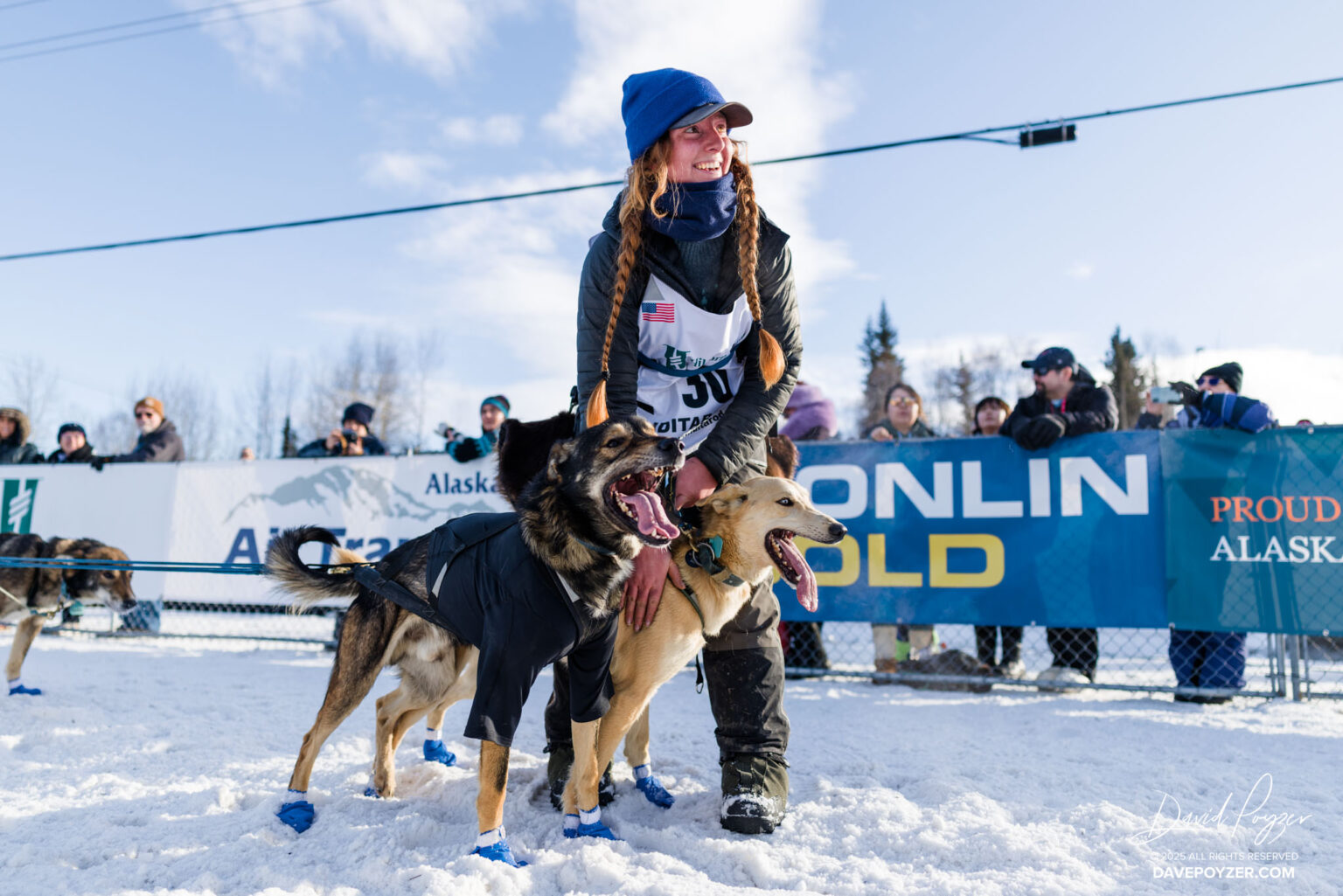 Rookie Iditarod musher Charmayne Morrison scratches at the Tanana ...