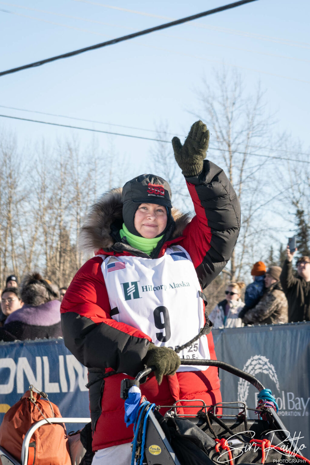 Rookie Brenda Mackey scratches at the Tanana checkpoint – Iditarod